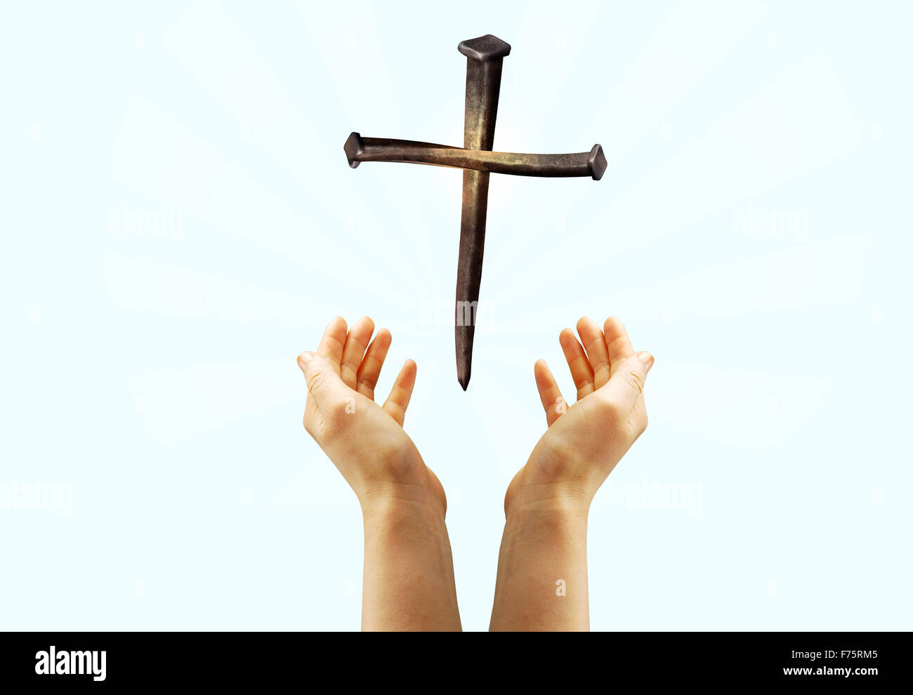 Hand and cross Stock Photo - Alamy