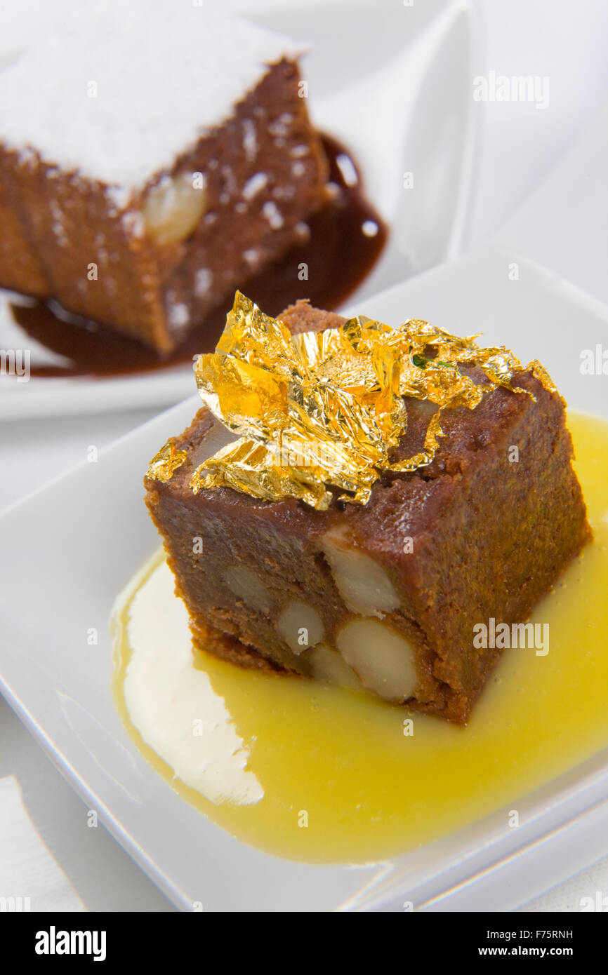 Cake with custard sauce Stock Photo - Alamy