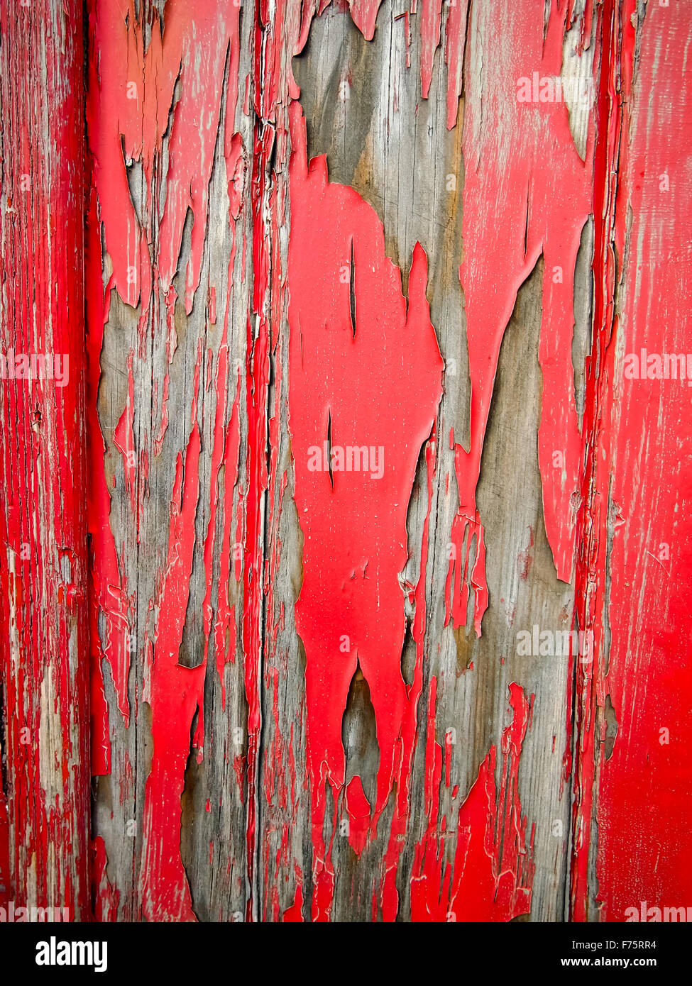 peeling red paint on a wooden door Stock Photo - Alamy