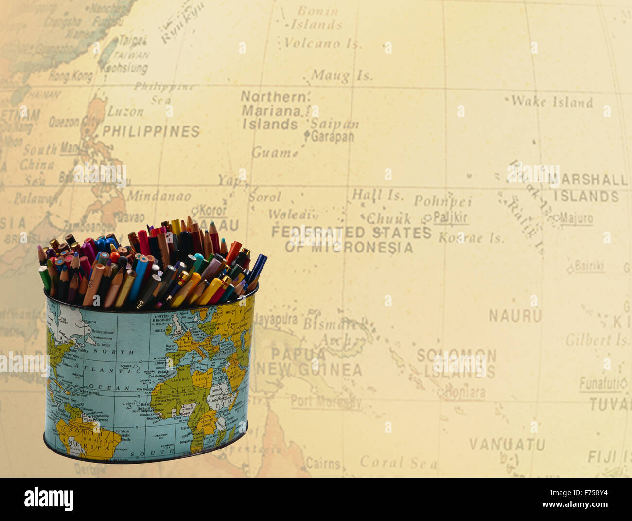 Pencils and a map Stock Photo - Alamy