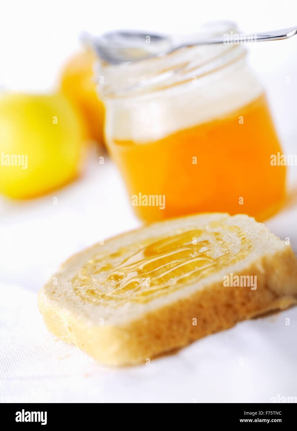Toast with honey Stock Photo - Alamy