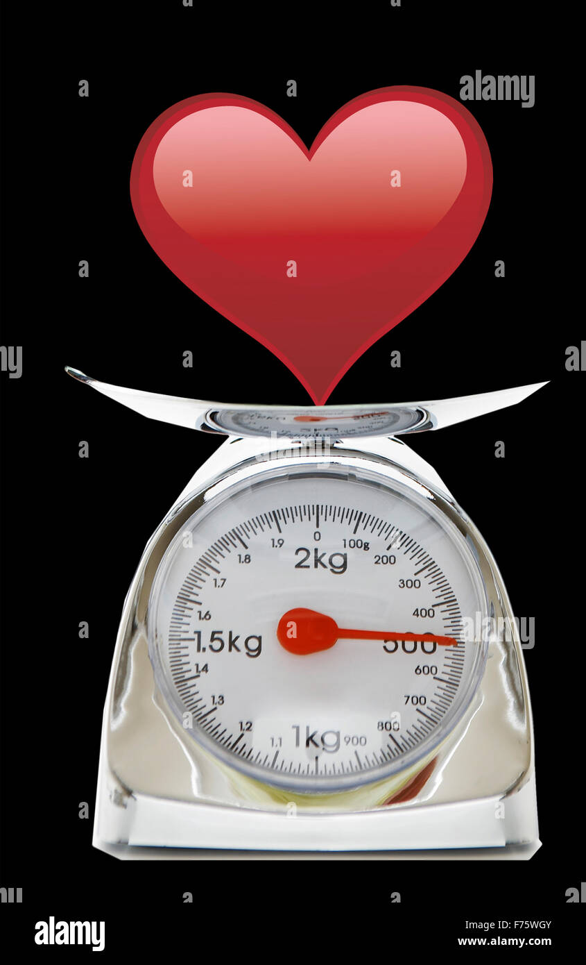 Heart and scale Stock Photo - Alamy