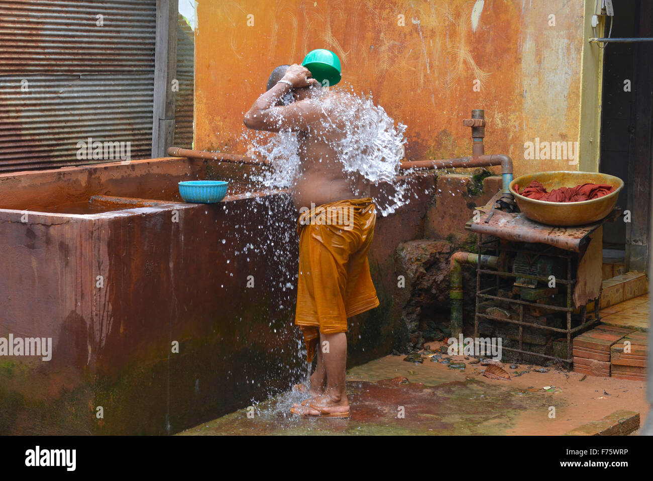 Monk taking a bath, Siem Reap, Cambodia Stock Photo - Alamy