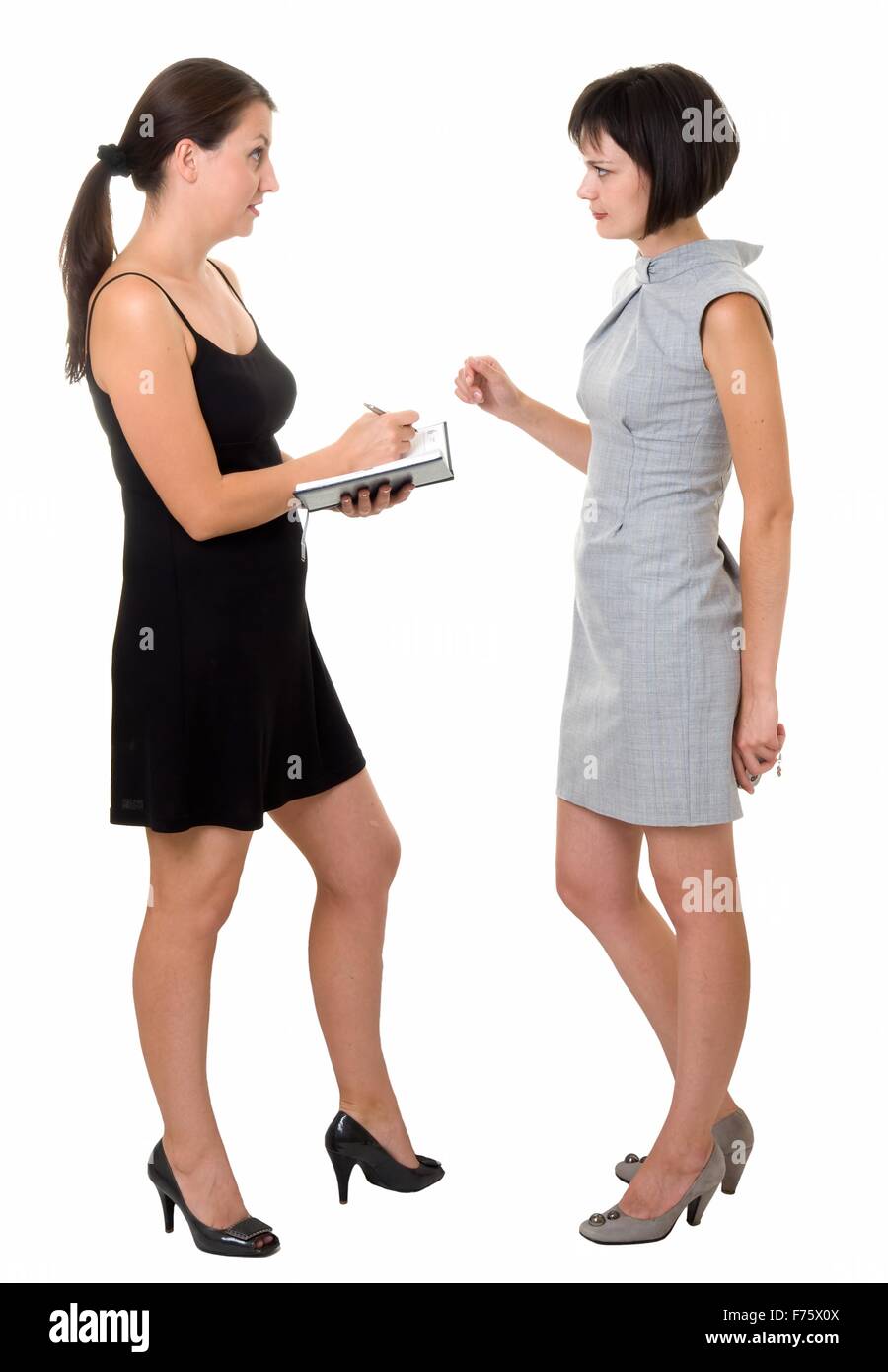 Woman taking notes Stock Photo - Alamy