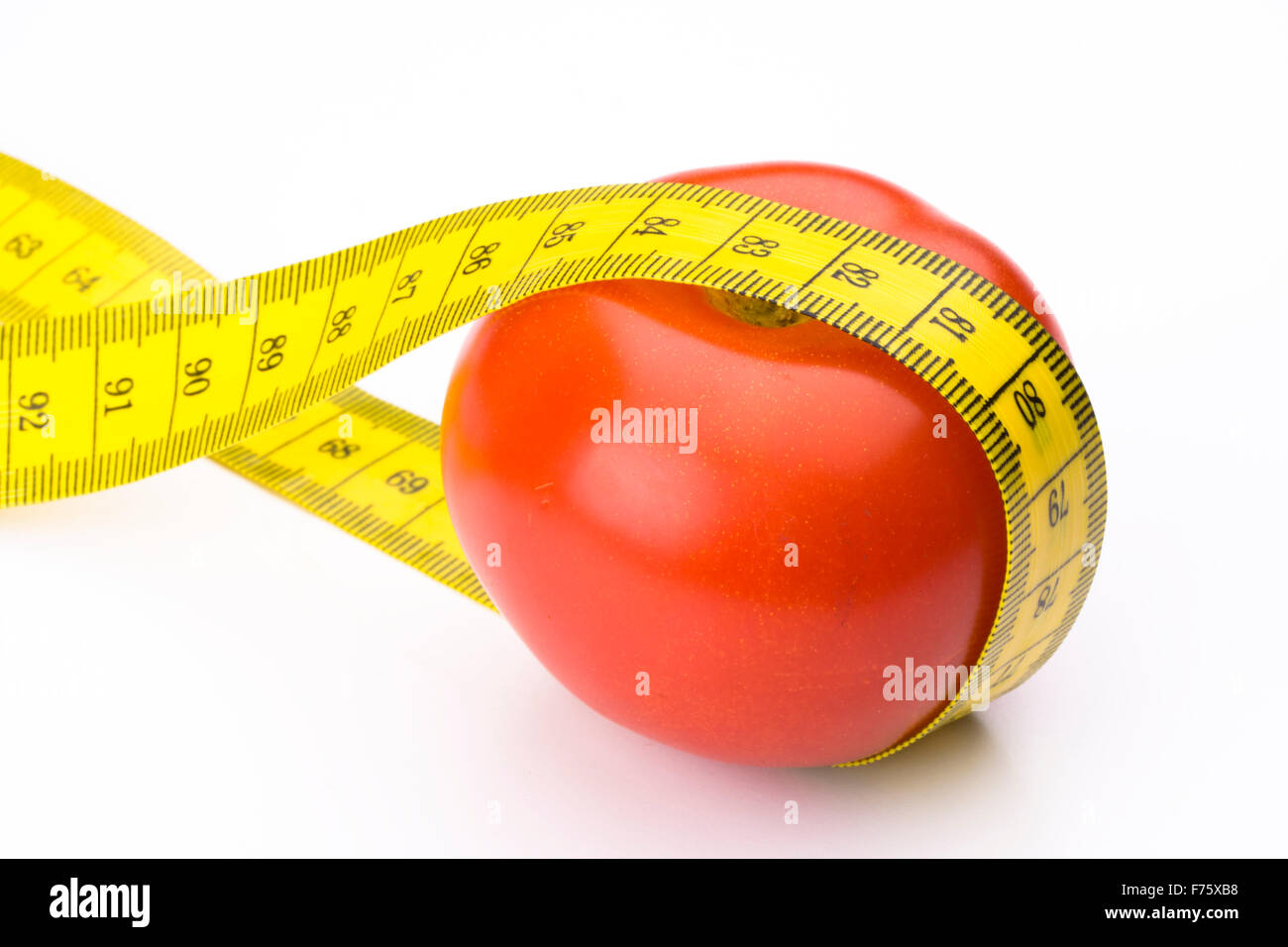 measuring tape and a tomato Stock Photo - Alamy