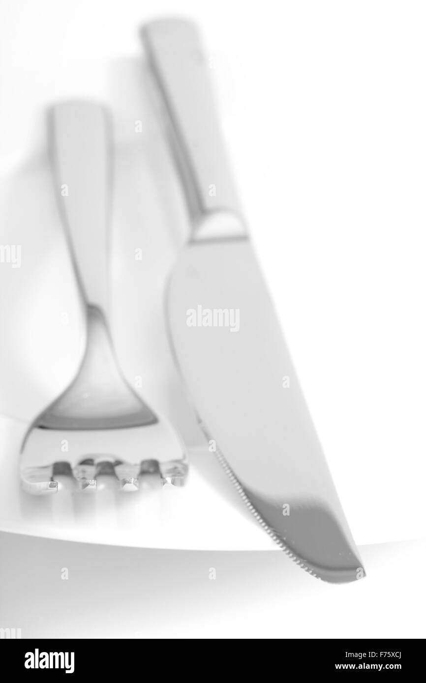 cutlery on a plate Stock Photo - Alamy