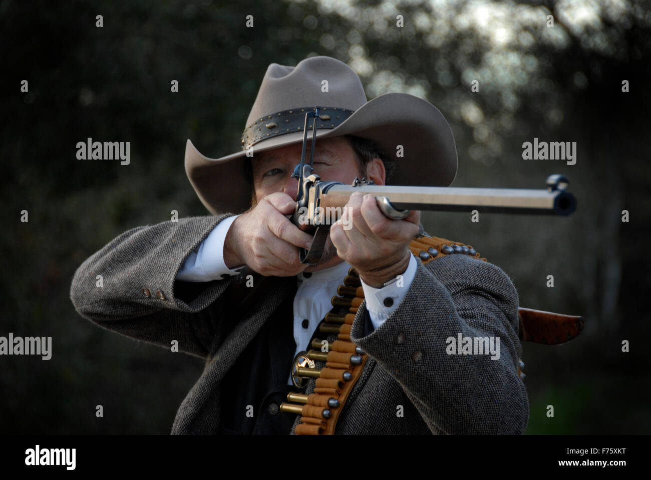 Cowboy with rifle hi-res stock photography and images - Alamy