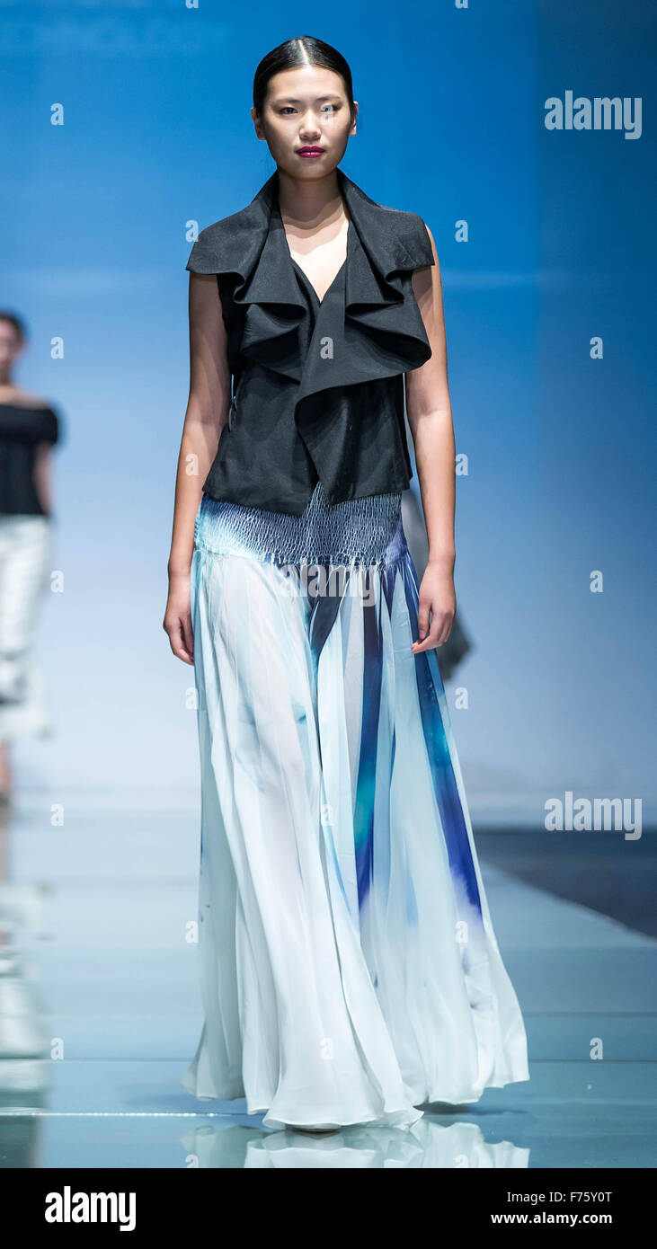 Beijing, China. 25th Nov, 2015. A model presents a creation designed by ...