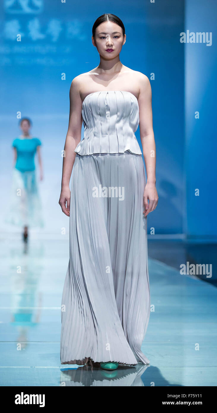 Beijing, China. 25th Nov, 2015. A model presents a creation designed by ...