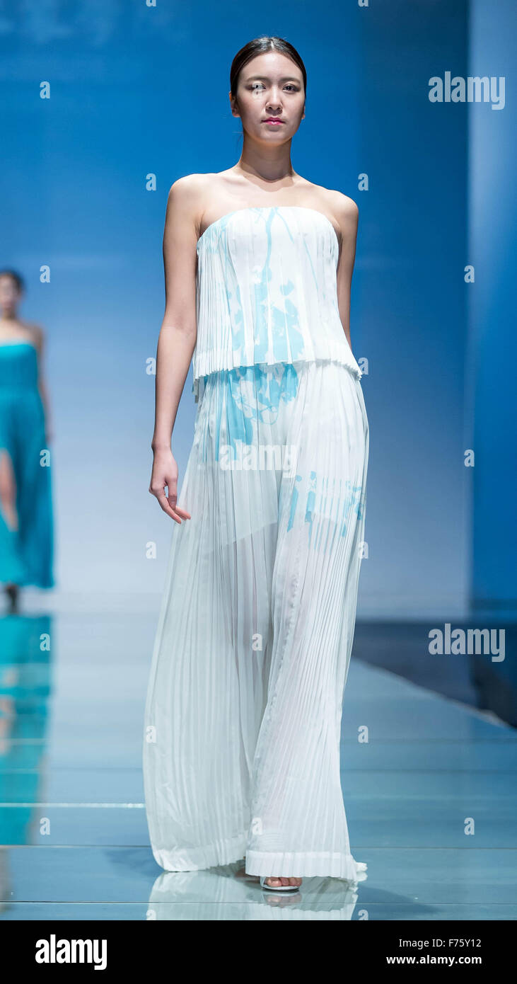 Beijing, China. 25th Nov, 2015. A model presents a creation designed by ...