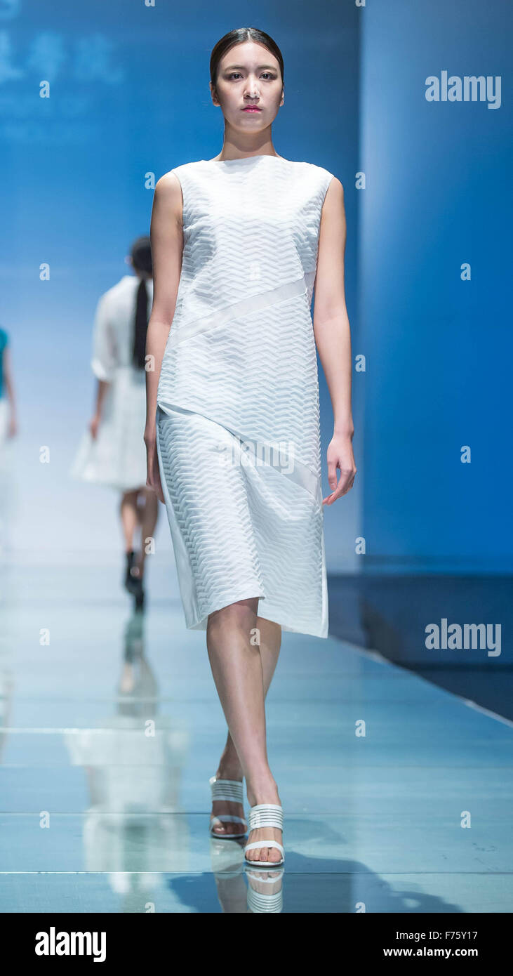 Beijing, China. 25th Nov, 2015. A model presents a creation designed by ...
