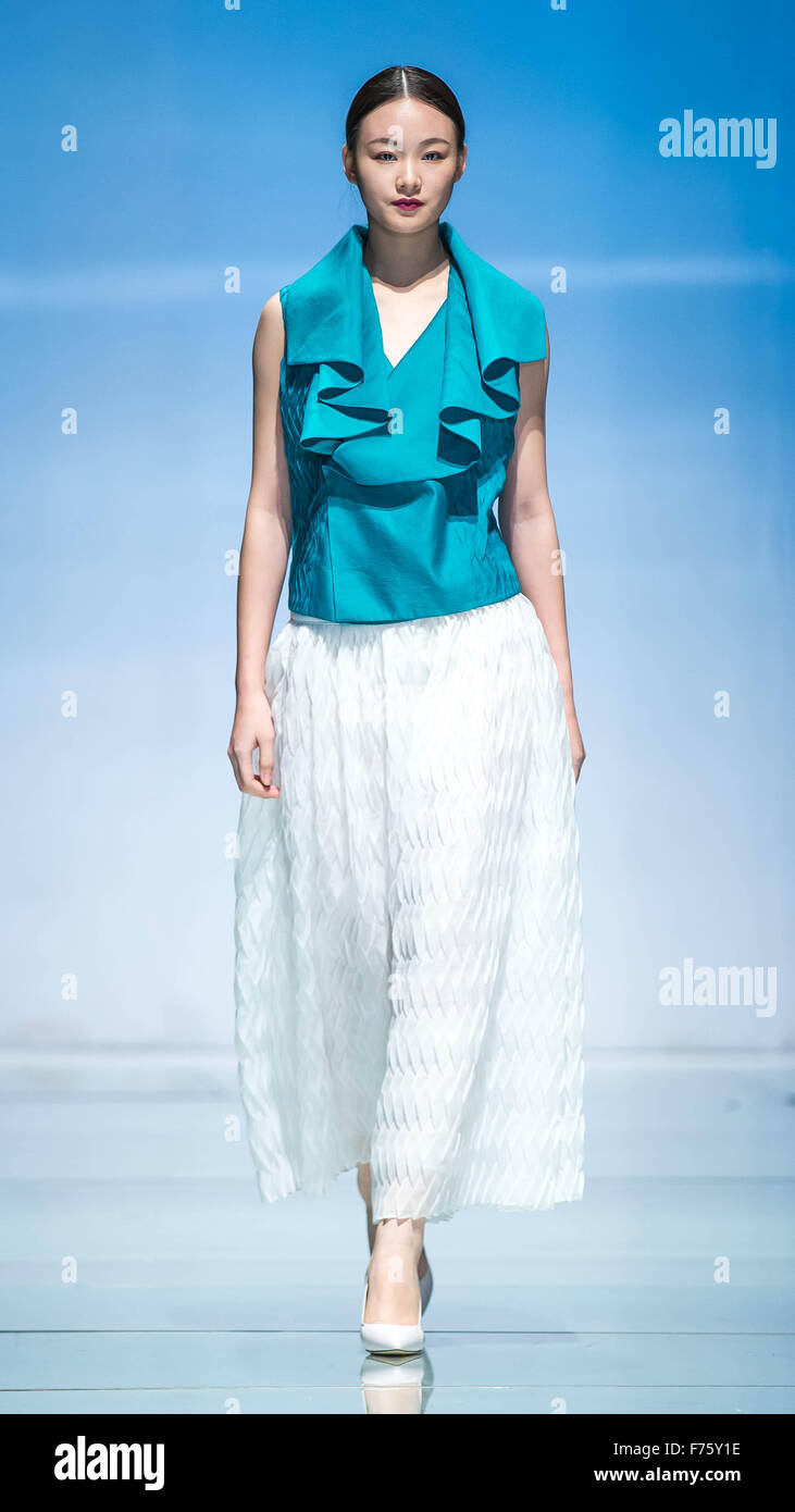 Beijing, China. 25th Nov, 2015. A model presents a creation designed by ...