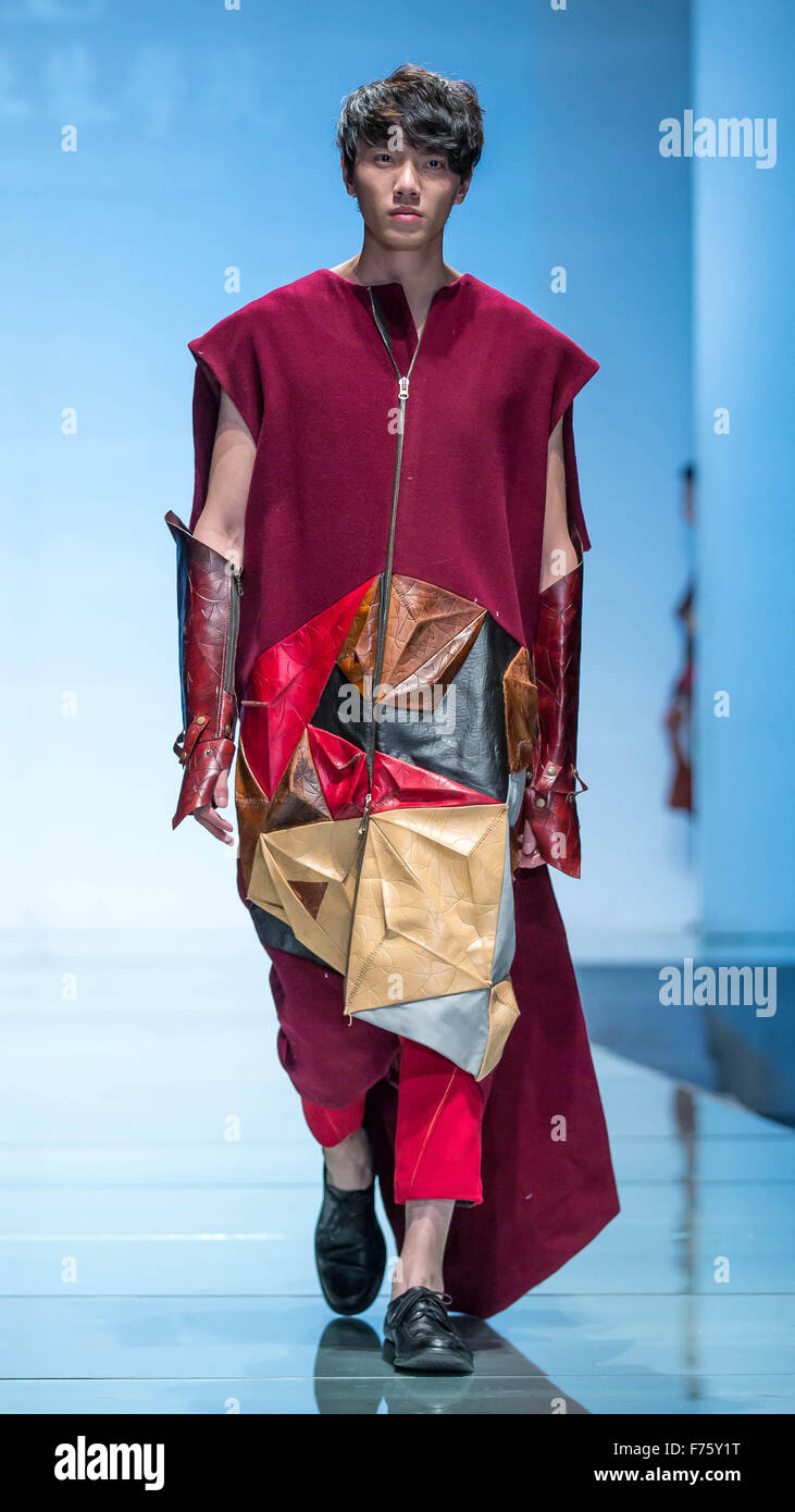Beijing, China. 25th Nov, 2015. A model presents a creation designed by ...