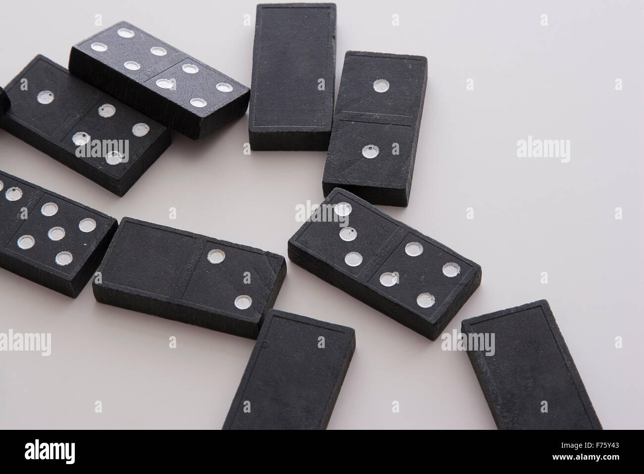 Fallen domino hi-res stock photography and images - Alamy
