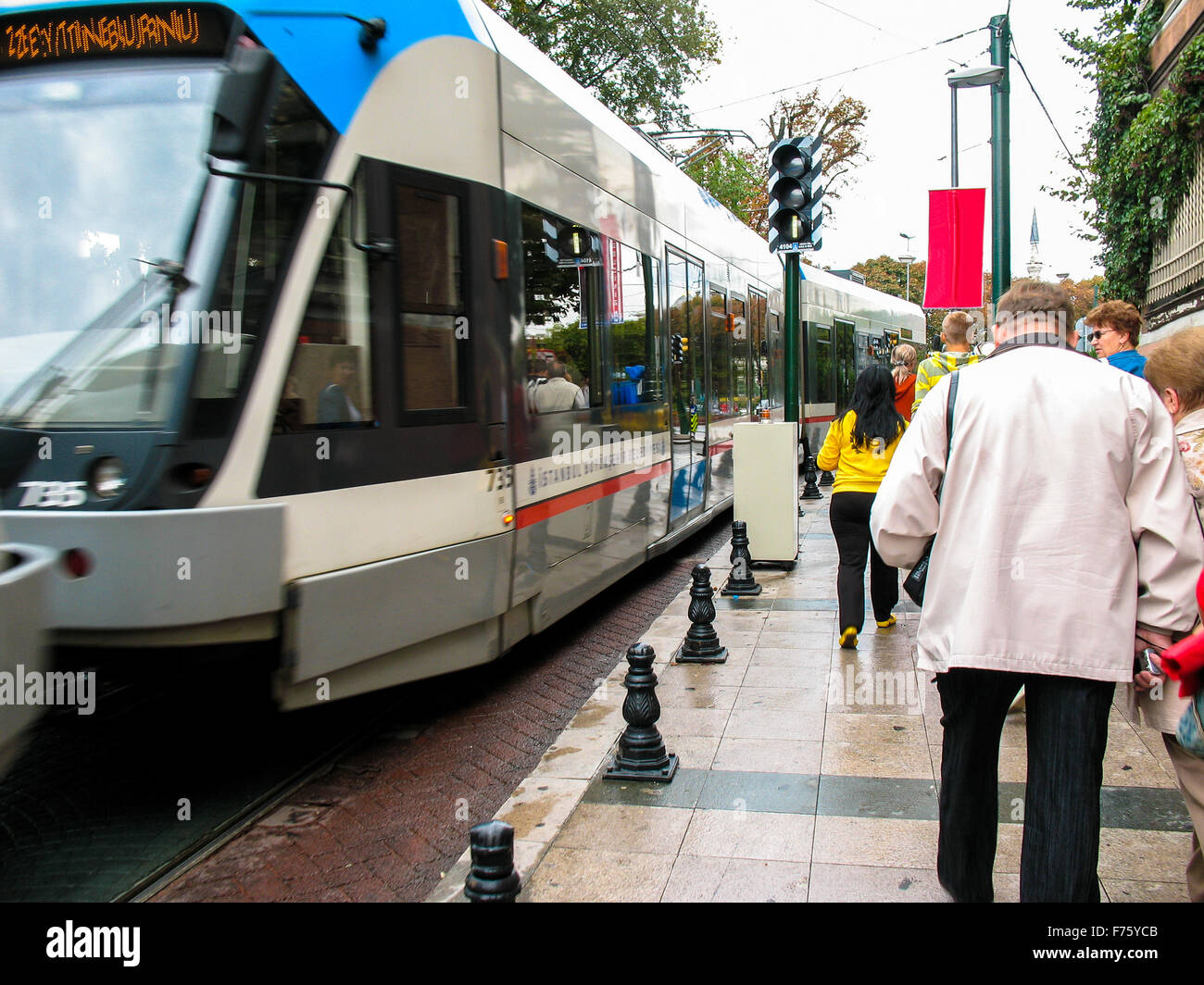 Istanbul, Turkey, light rail, Central street after the rain, a group of ...
