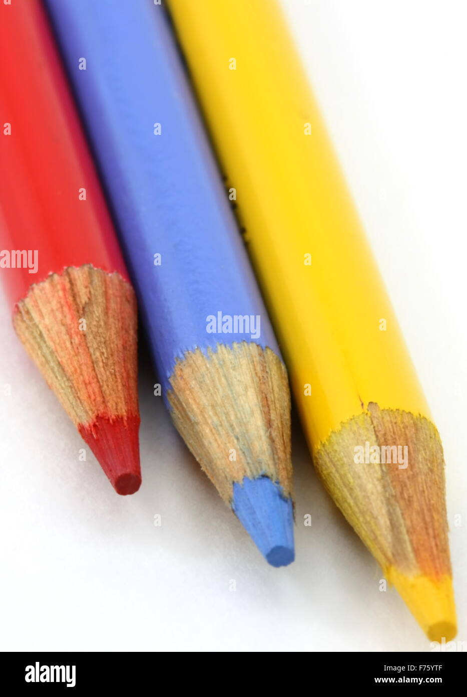 Pencil crayons, red, blue yellow colors Stock Photo - Alamy