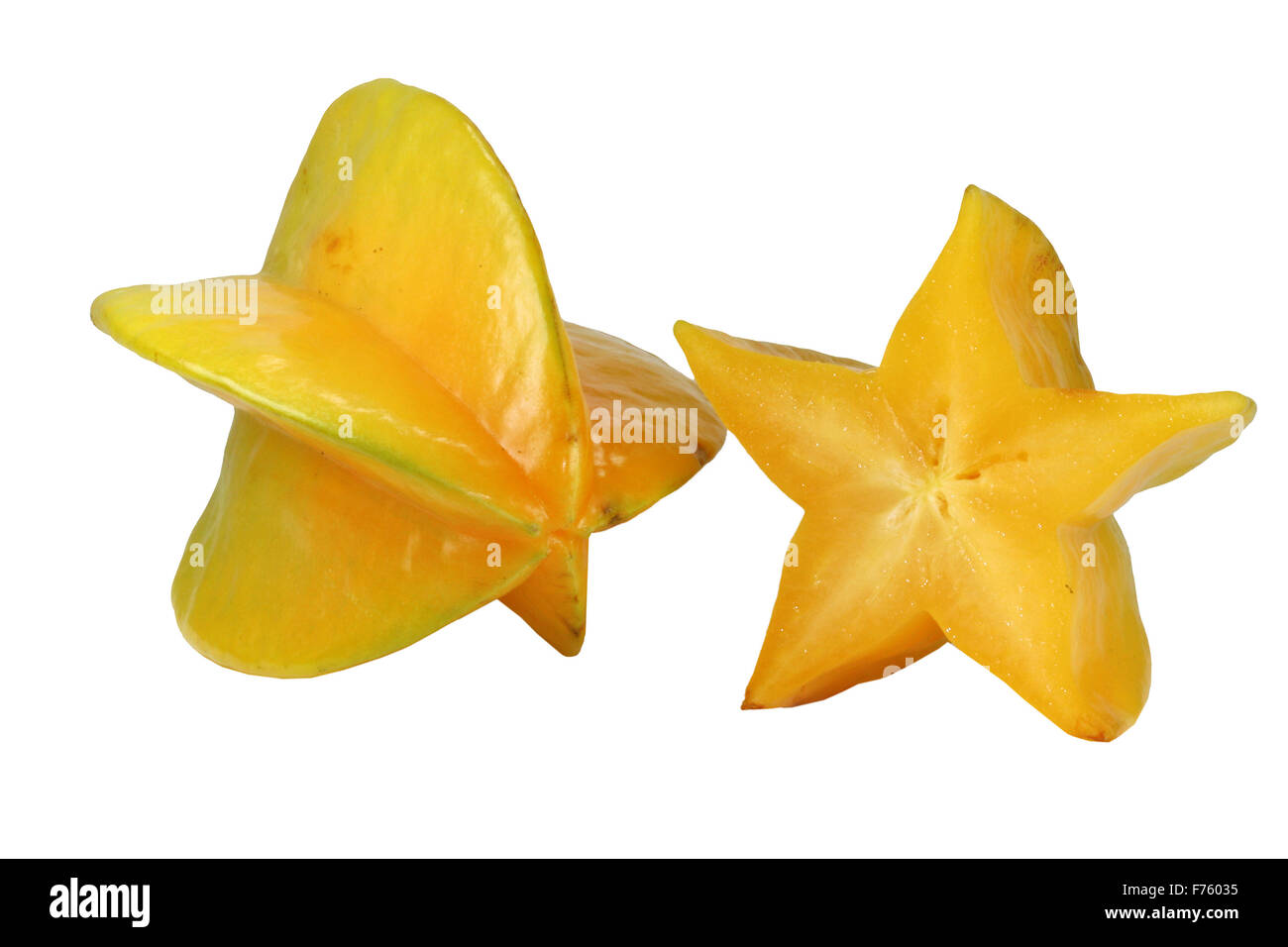 2 five star fruit on white background Stock Photo - Alamy