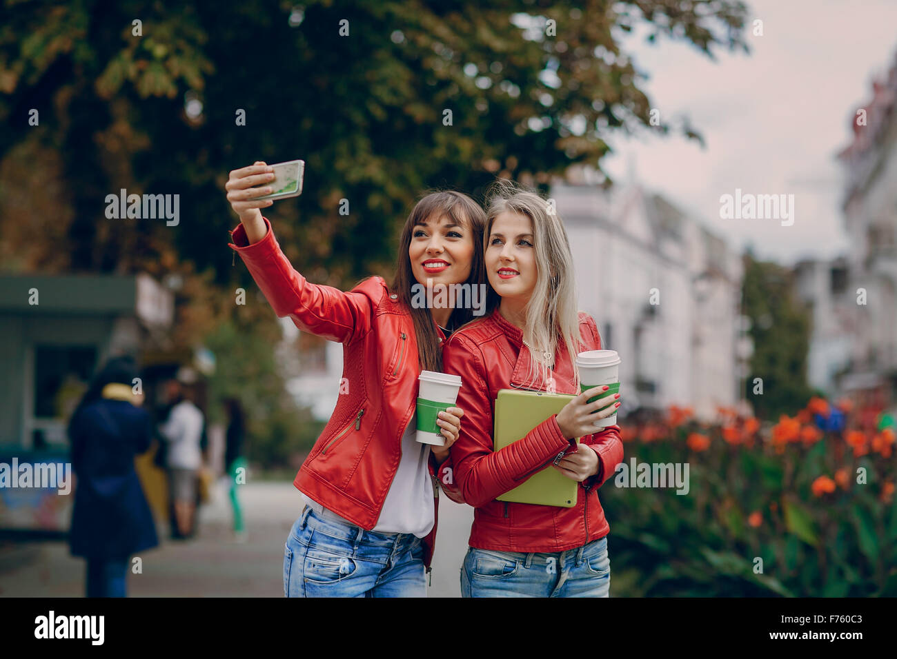 girls with phone Stock Photo - Alamy