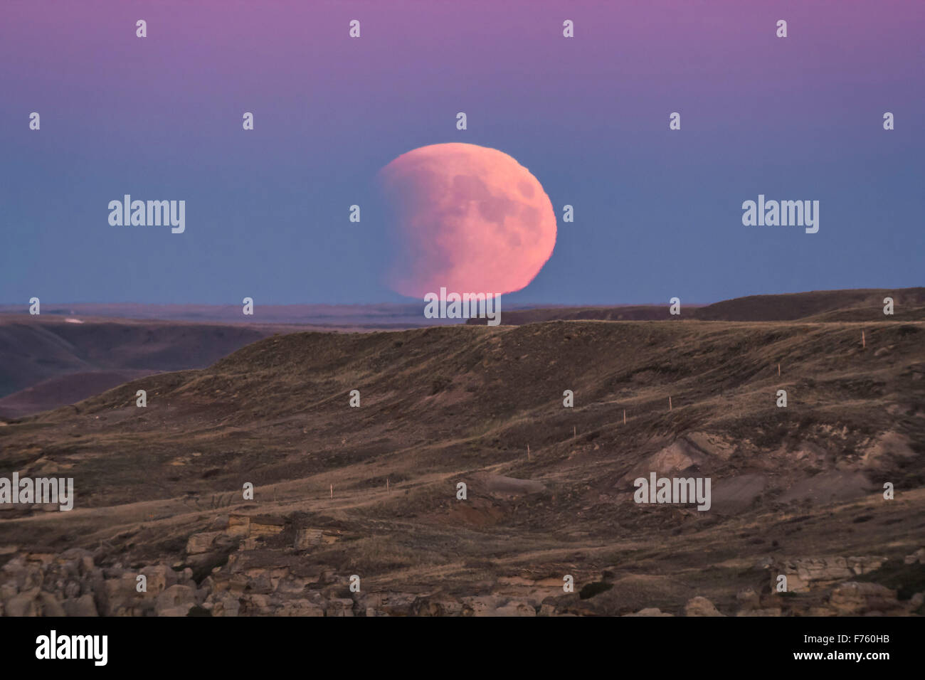 The Full Moon rising in partial eclipse on the night of September 27 ...