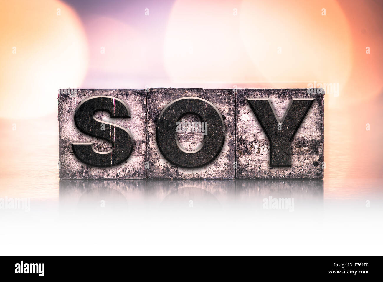 The word "SOY" written in vintage ink stained letterpress type Stock ...