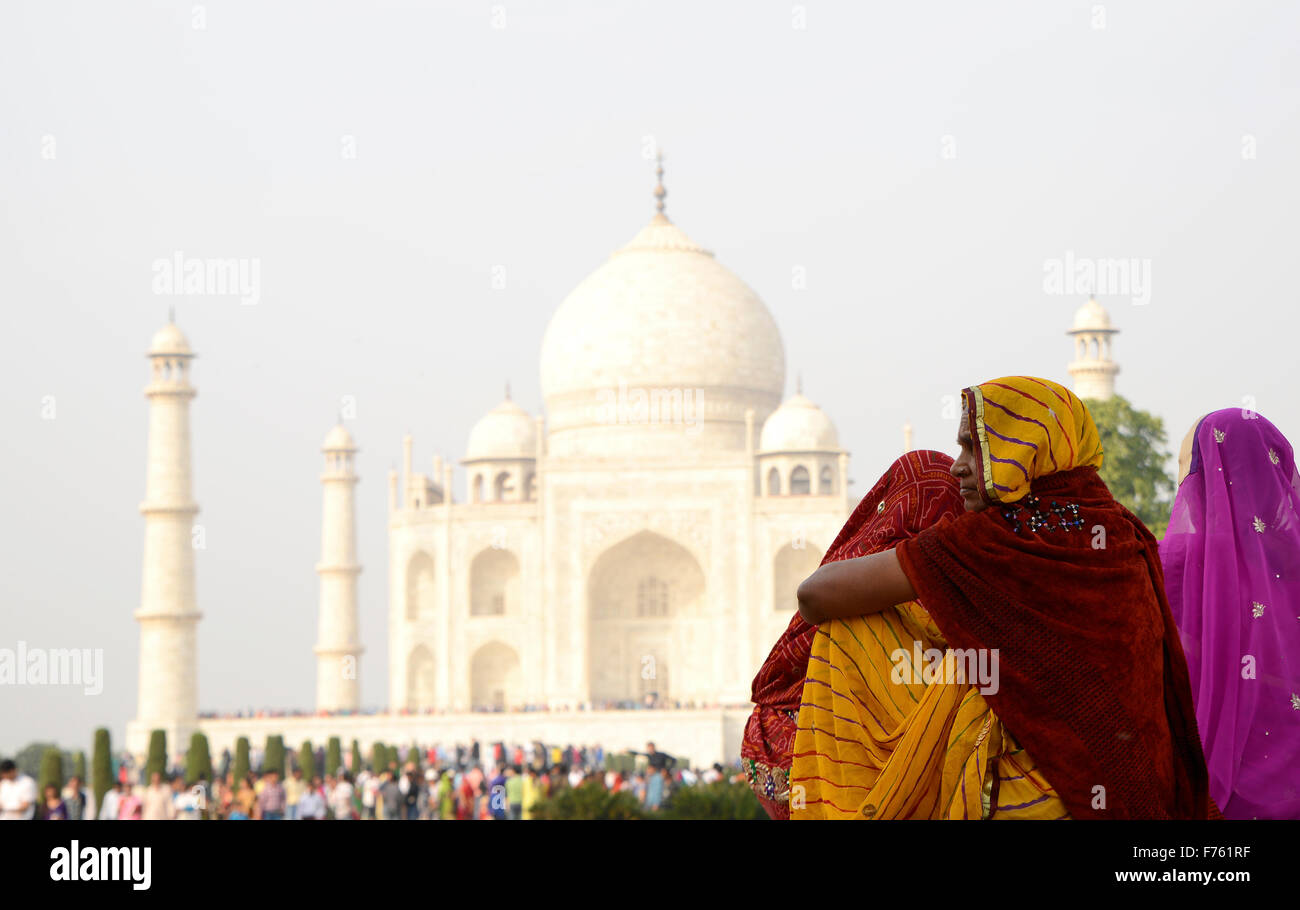 Women wearing colorful dress and enjoying beautiful Taj-Architecture ...
