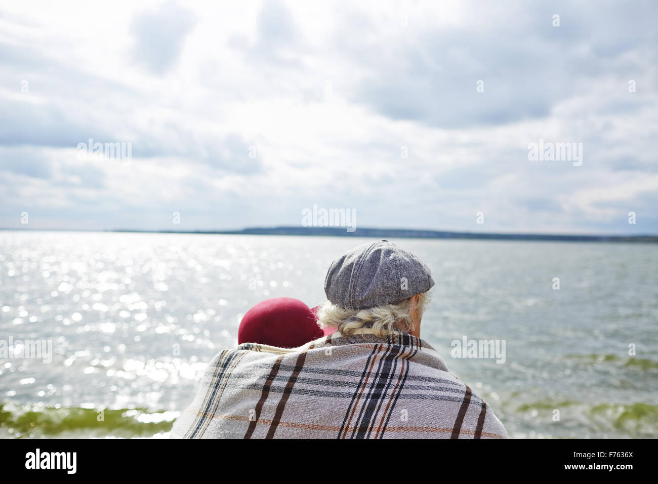 Back view of affectionate seniors view of seaside Stock Photo - Alamy