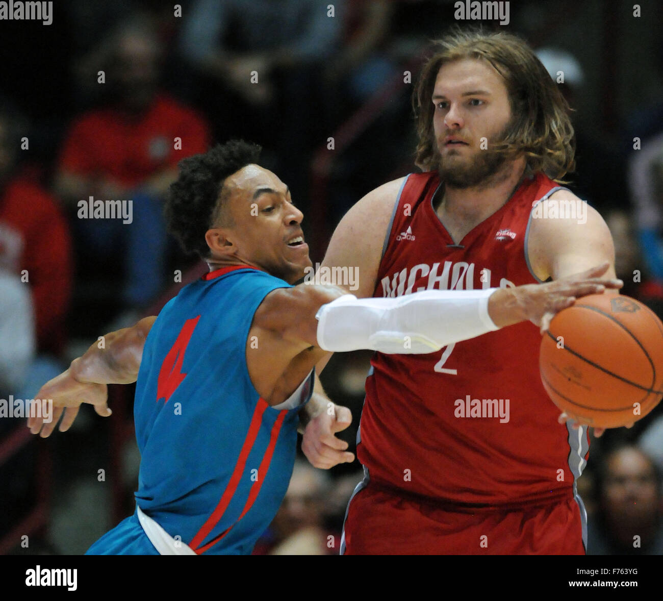 Rio Rancho, NM, USA. 25th Nov, 2015. UNM's # 4 Elijah Brown reaches in ...