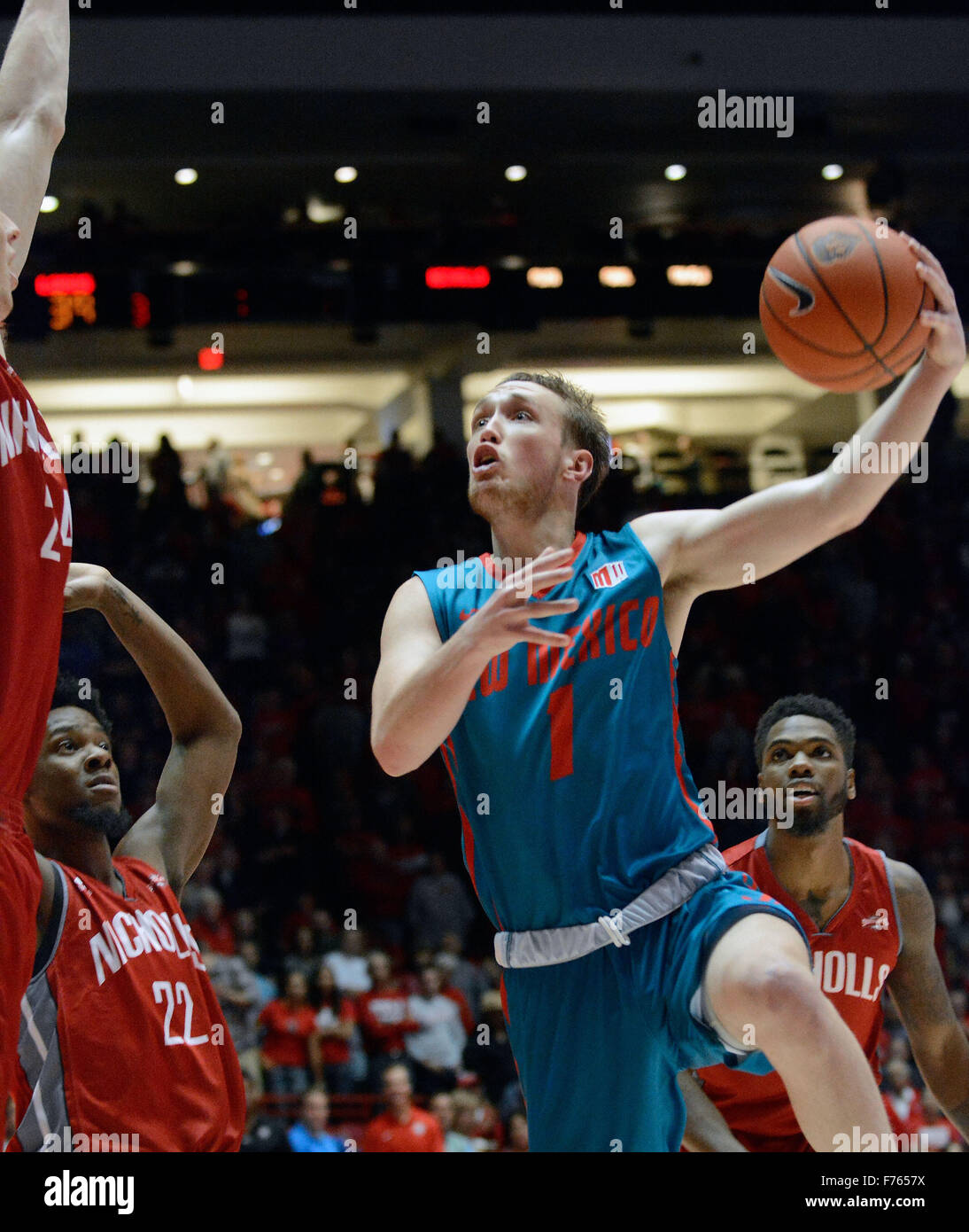 Rio Rancho, NM, USA. 25th Nov, 2015. UNM's # 1 Cullen Neal makes a hook ...