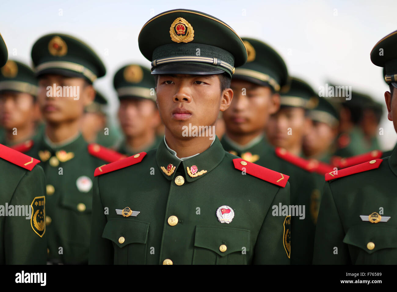 Kunming, Yunnan, China. 25th Nov, 2015. New militray recruits are given ...