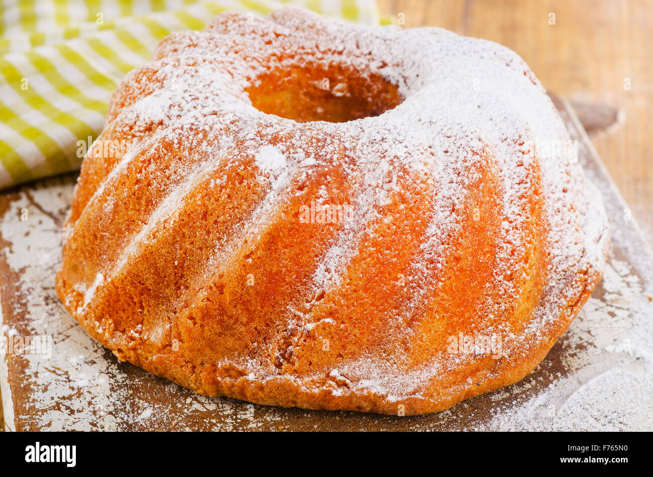 Sweet sponge cake on wooden board. Selective focus Stock Photo - Alamy