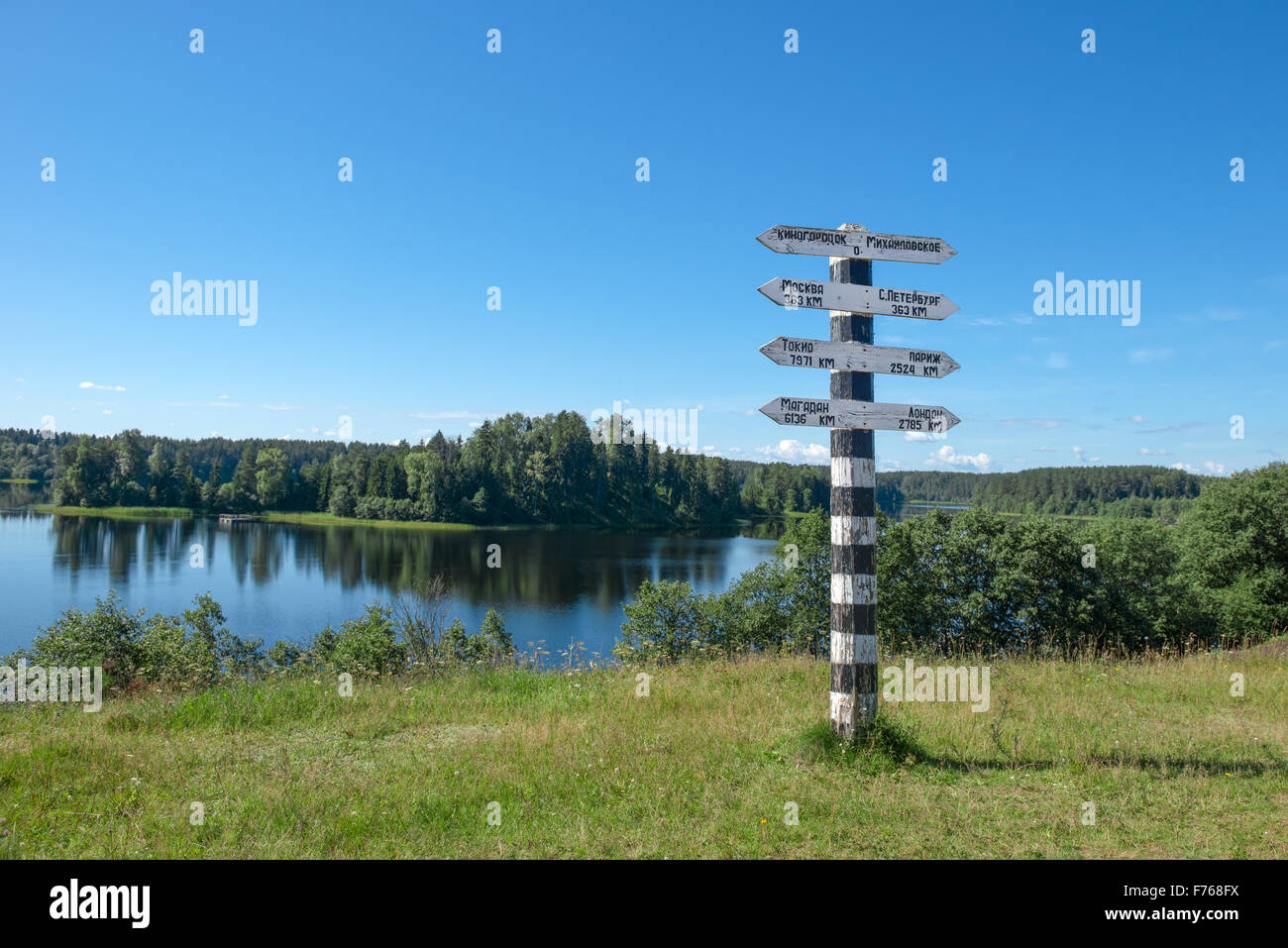Road sign at the crossroads in the Russian province Stock Photo - Alamy