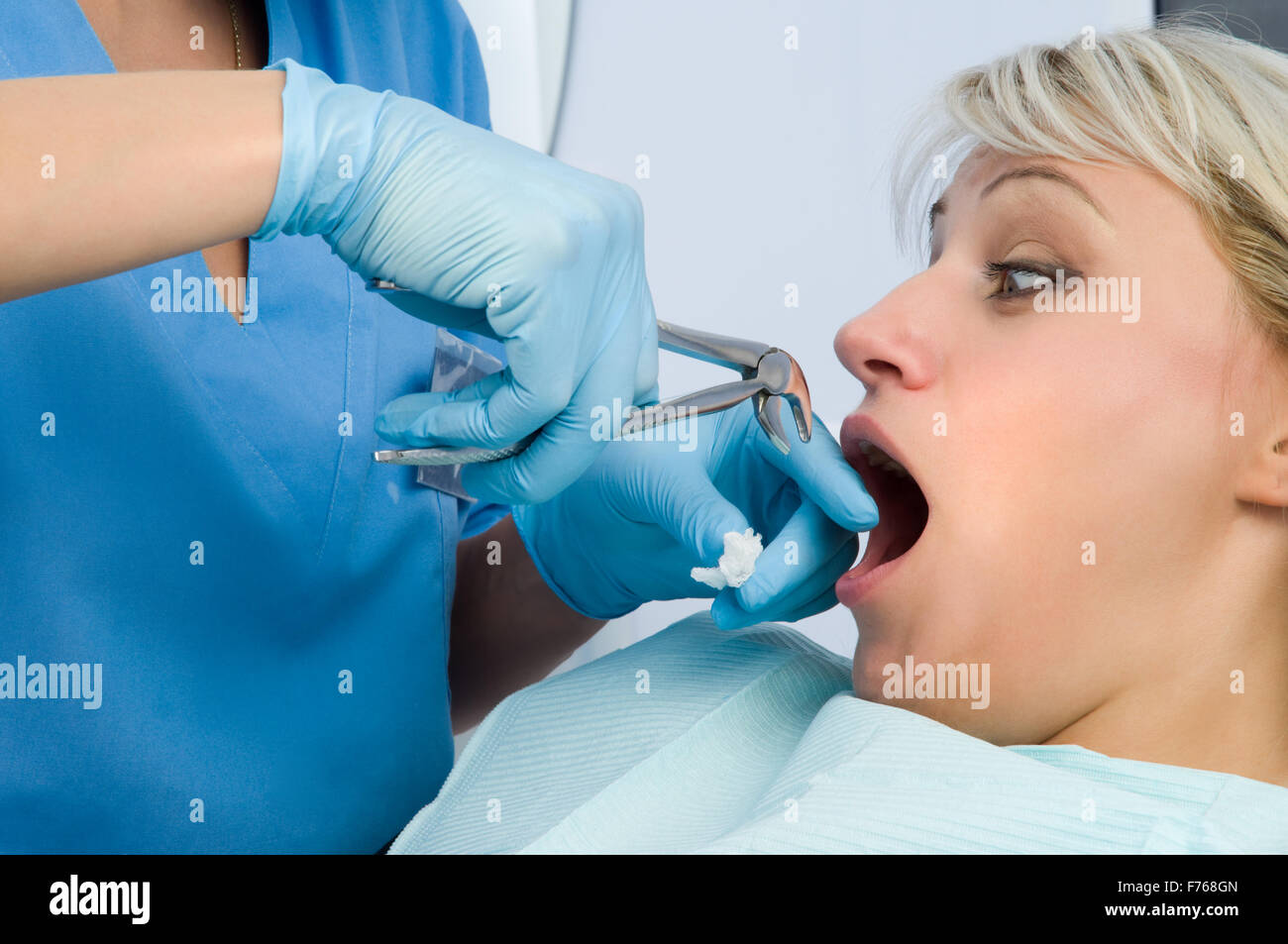 tooth extraction, scared patient Stock Photo - Alamy