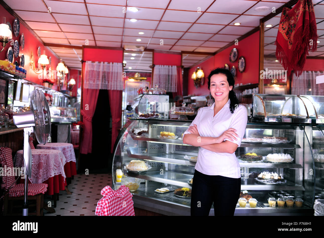 owner of a small pastry store Stock Photo - Alamy