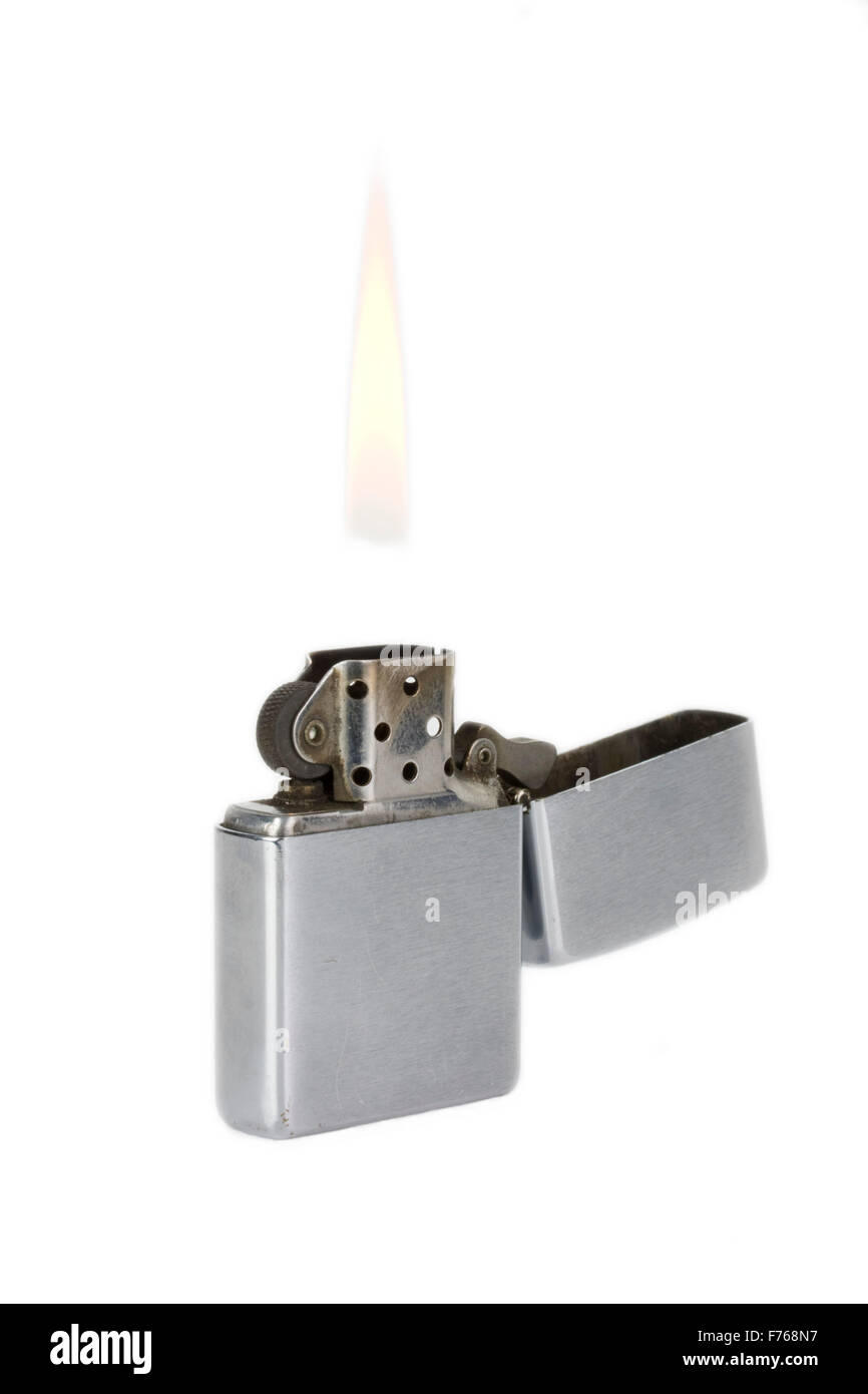 battered lighter with flame on white background Stock Photo - Alamy