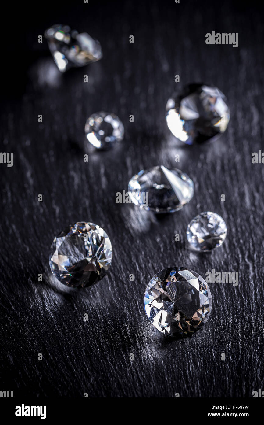 Shiny diamonds on dark background Stock Photo - Alamy