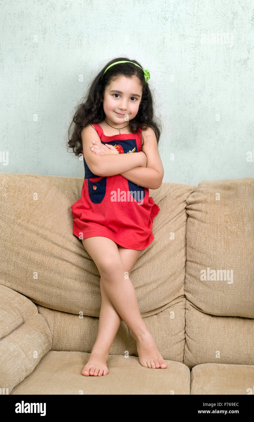little girl and folded arms Stock Photo - Alamy
