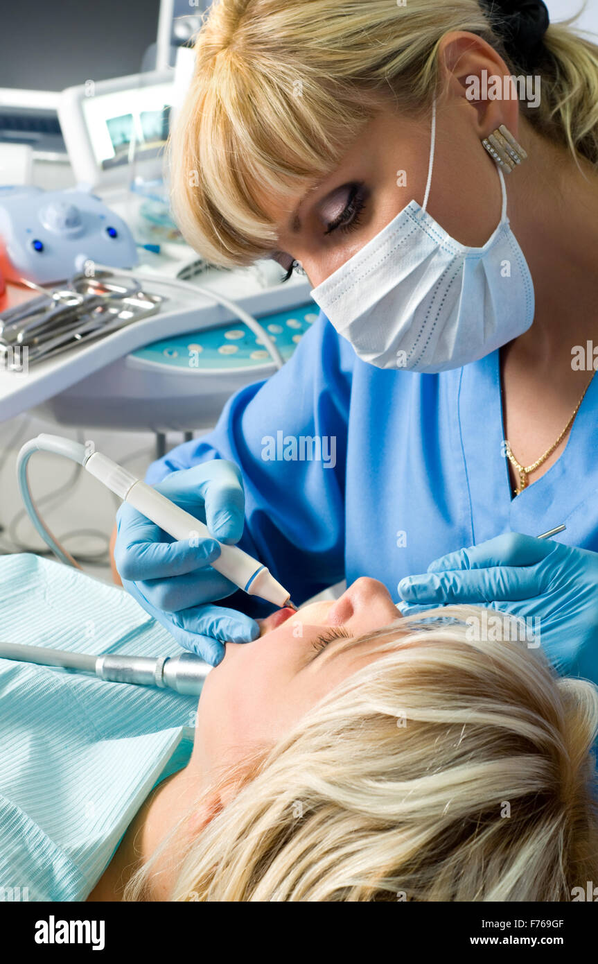 dentistry, doctor and patient, drilling the tooth Stock Photo - Alamy