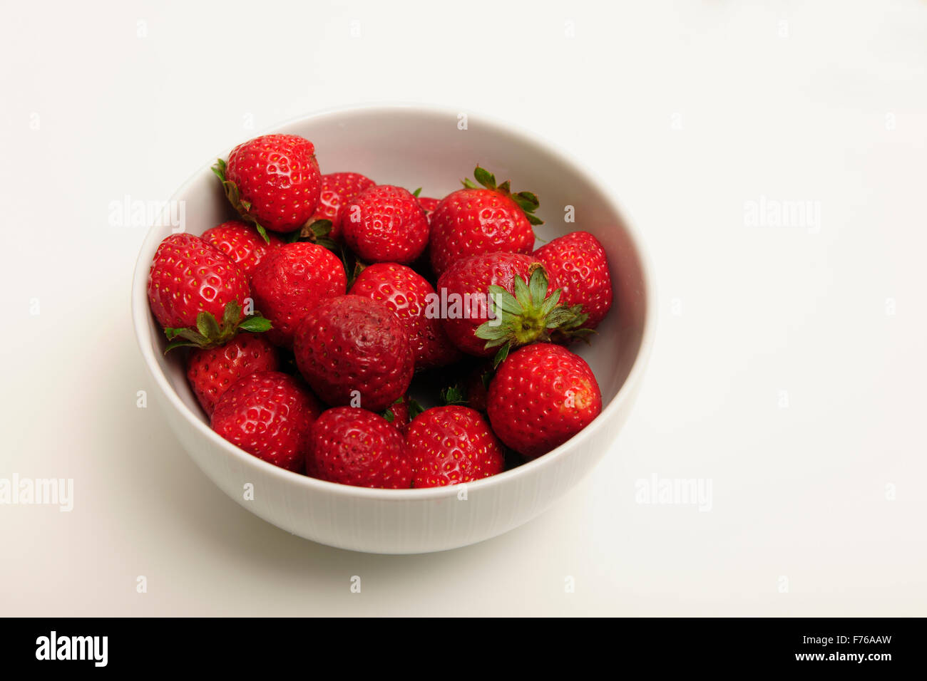 organic straberries in white dish Stock Photo - Alamy