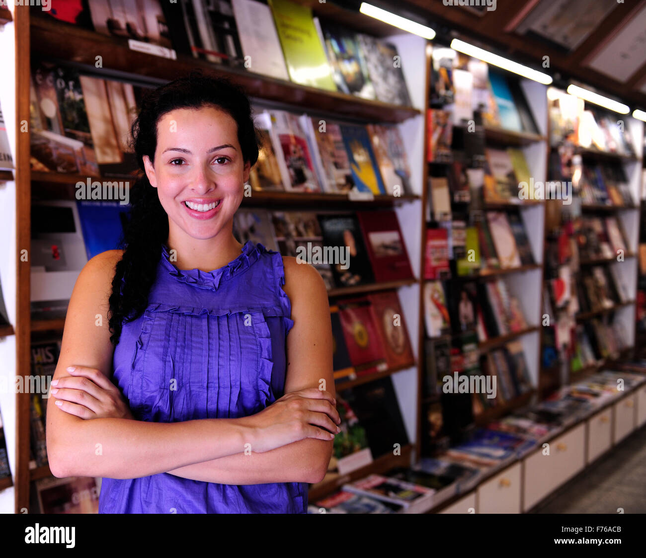happy owner of a bookstore Stock Photo - Alamy