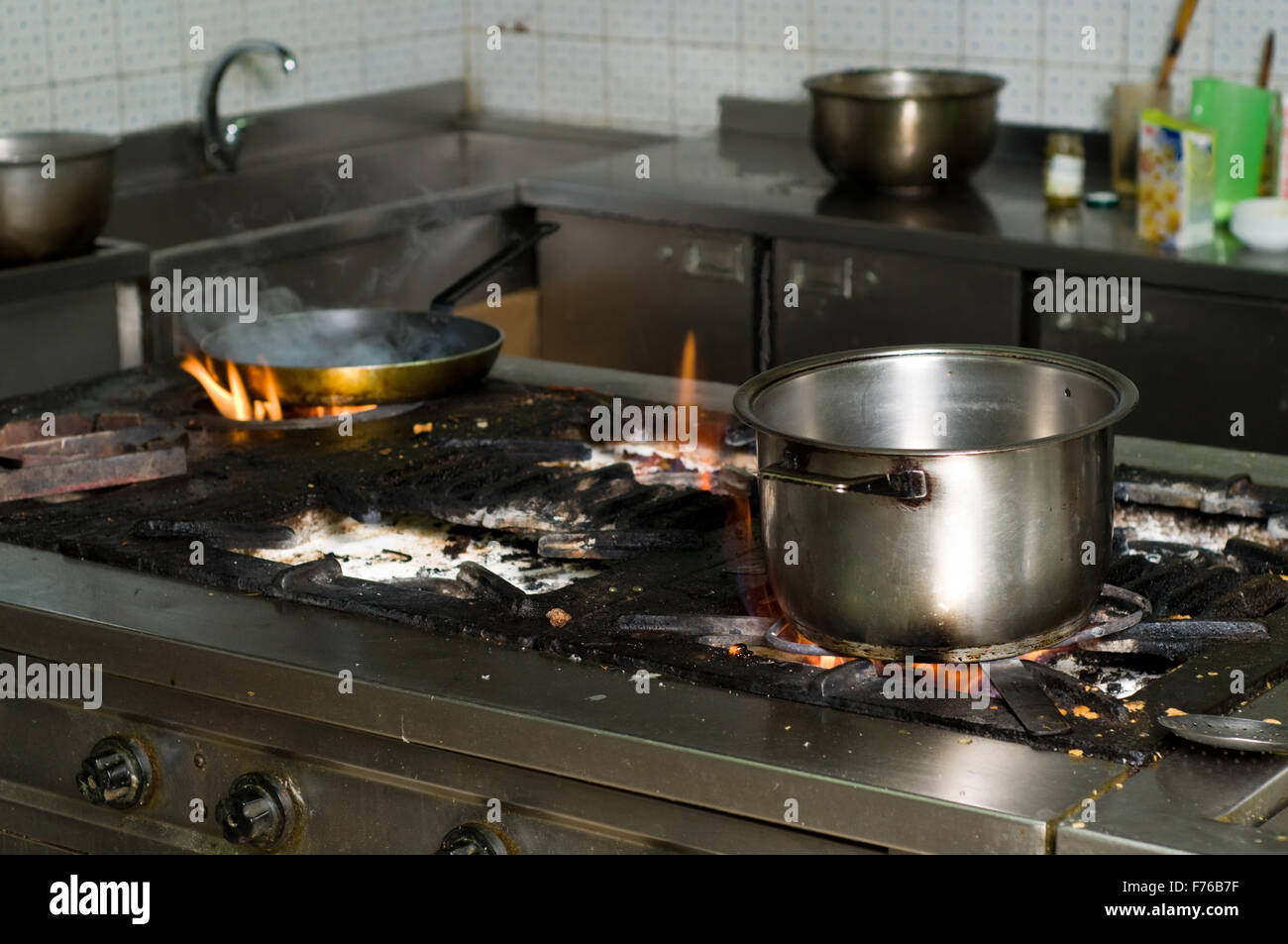 dirty commercial kitchen interior Stock Photo - Alamy