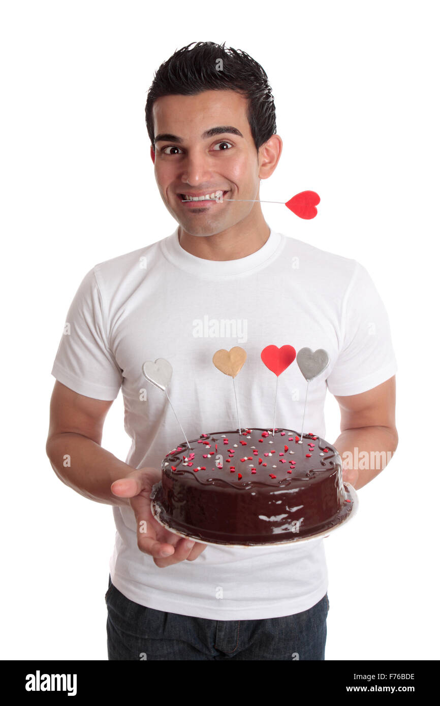 Valentine Fun- Male with chocolate heart cake Stock Photo - Alamy