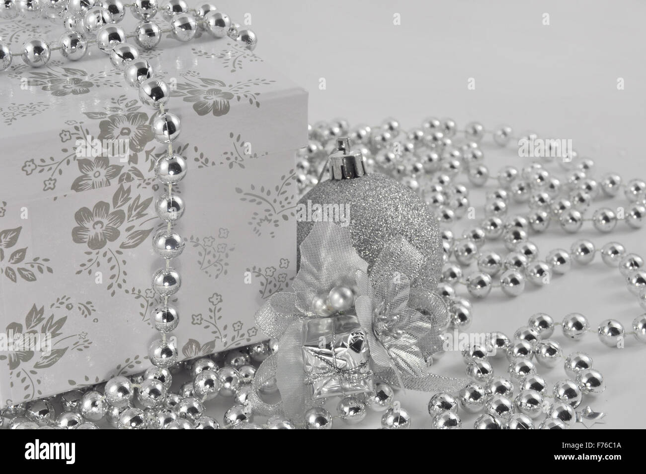 Christmas box ball silver Stock Photo - Alamy