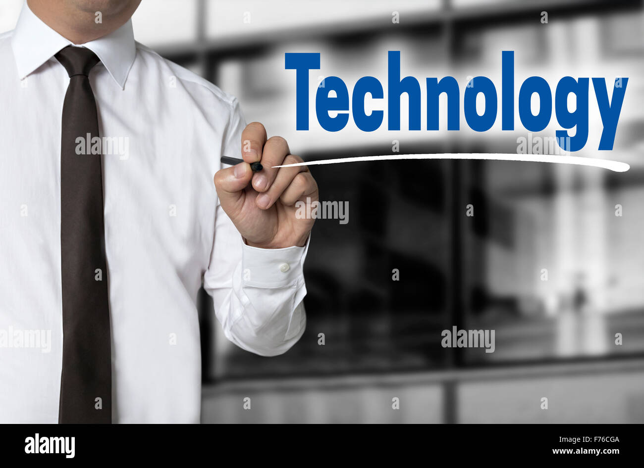 Technology is written by businessman background concept Stock Photo - Alamy