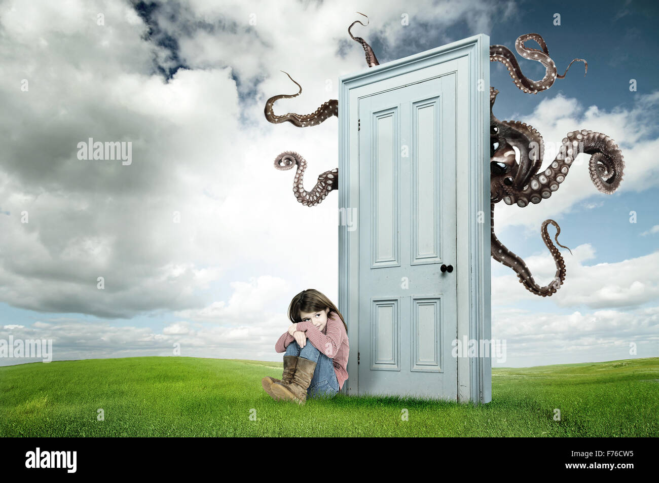 Young girl fearing a monster behind a door Stock Photo - Alamy