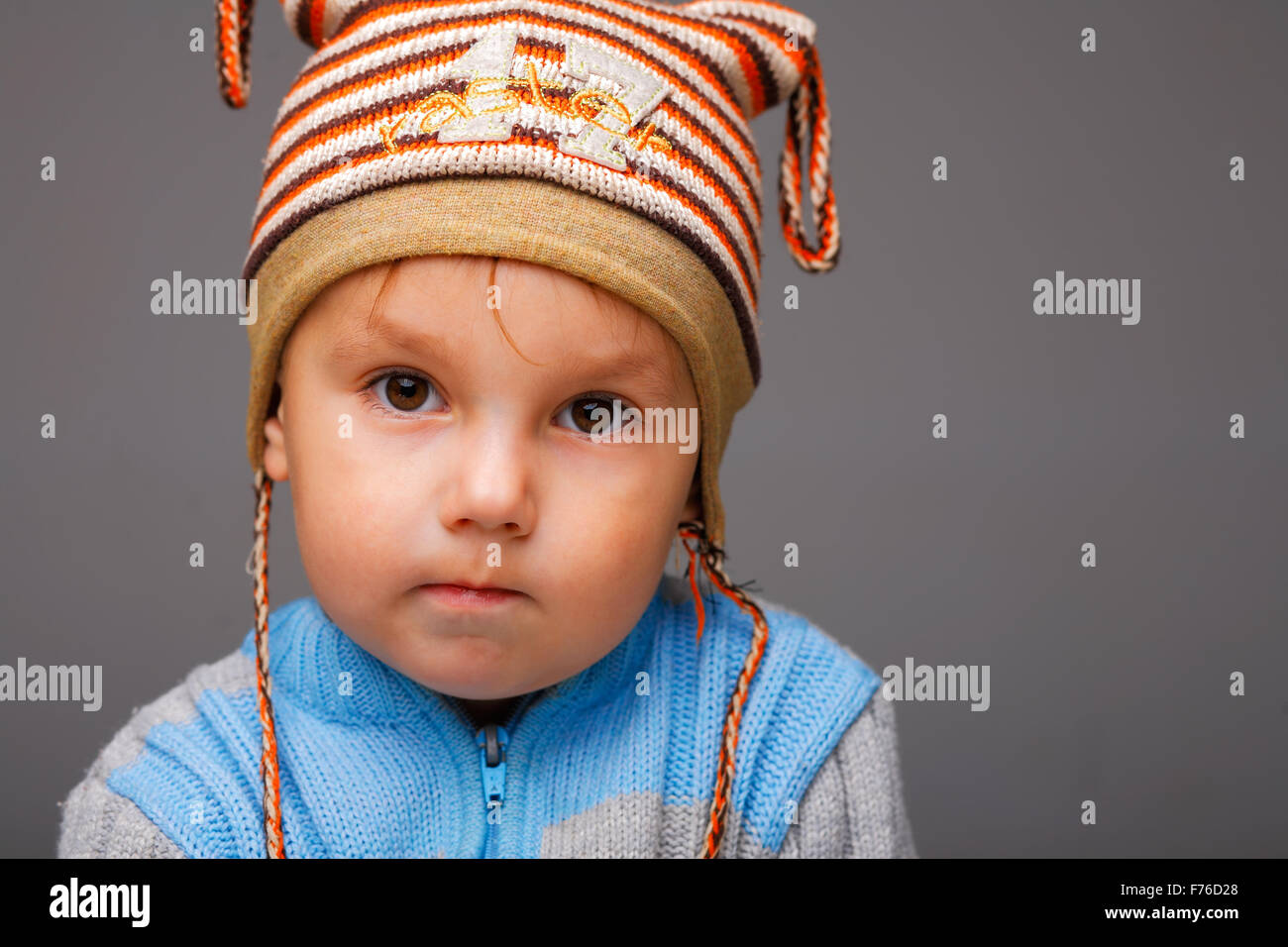 Portrait of a serious little boy Stock Photo - Alamy