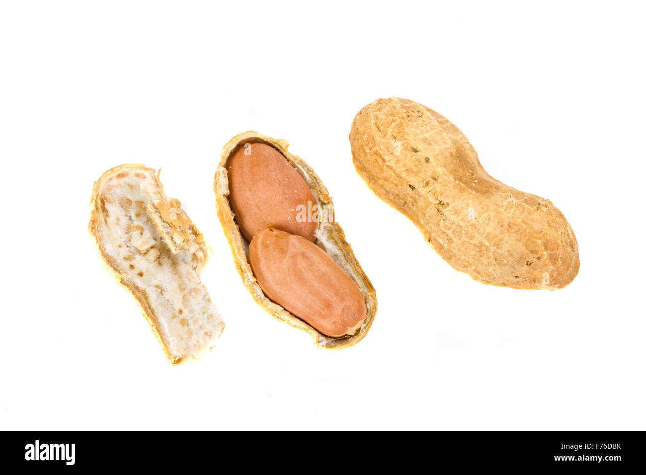 some natural peanuts on white background Stock Photo - Alamy