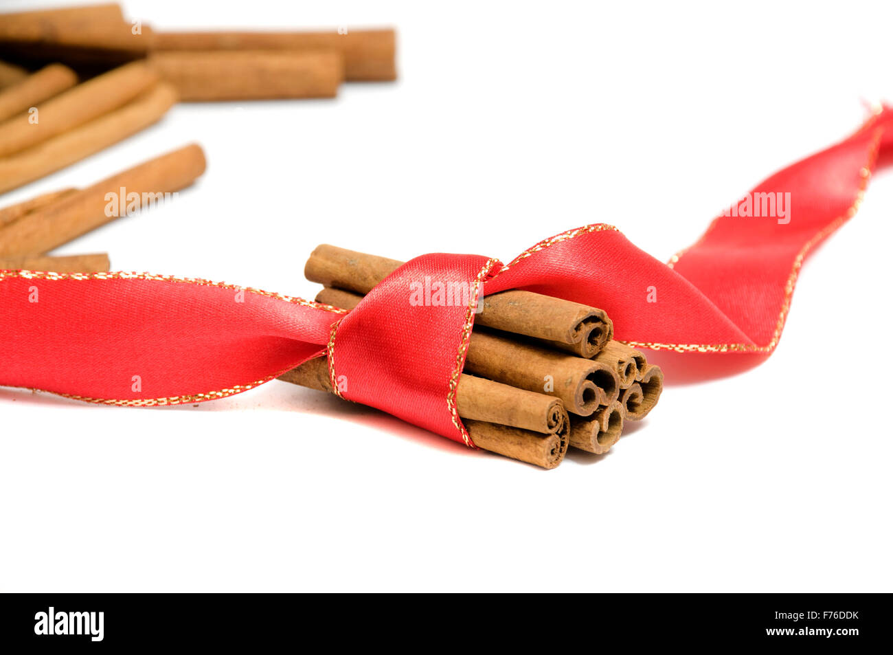 red ribbon and cinnamon rolls Stock Photo - Alamy
