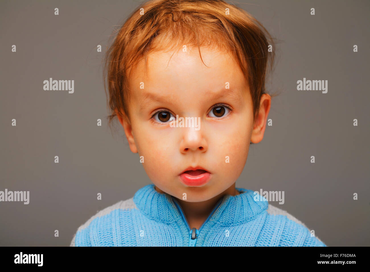 Surprised boy's portrait Stock Photo - Alamy
