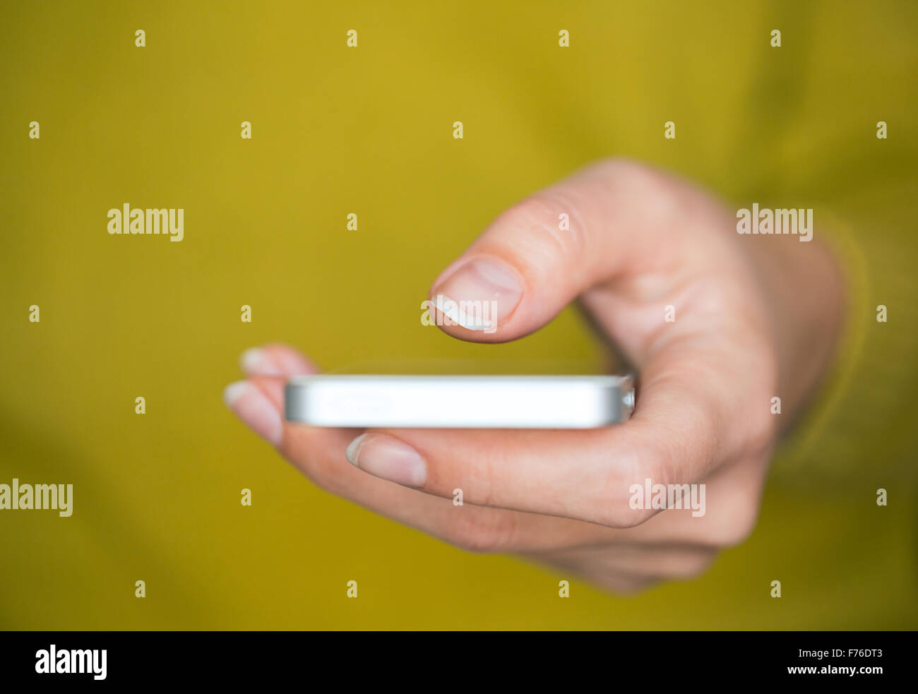 Female hand holding smartphone - communication concept Stock Photo - Alamy