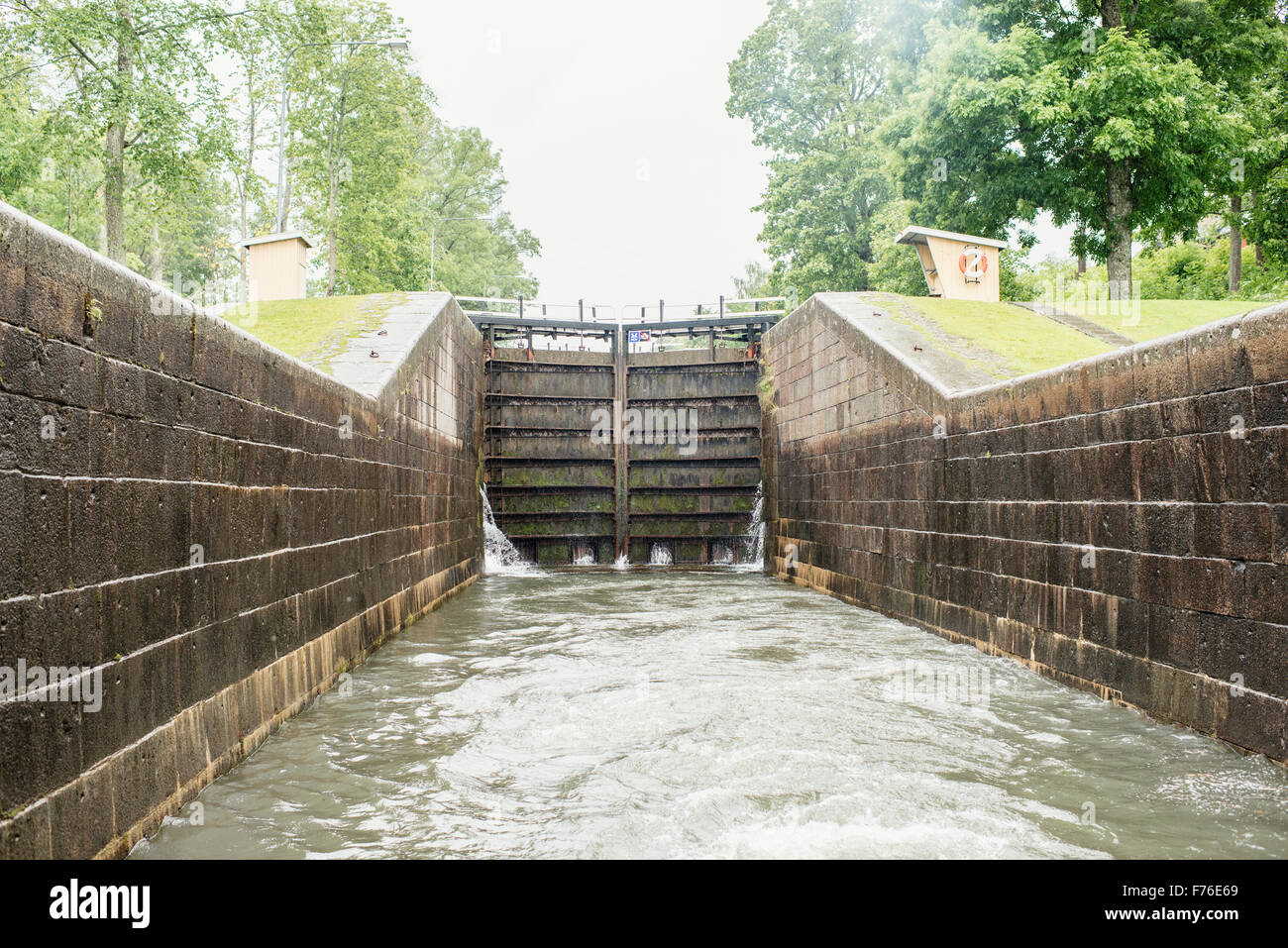 Sea lock at Gota Canal in Sweden. Water and floodgate doors Stock Photo ...